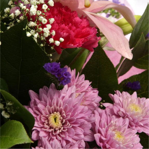 Stunning Pink Cerise BouquetThis Sweet Pink bouquet features matching ...